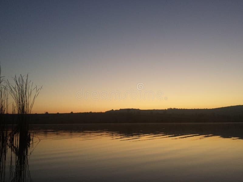 Sunrise and Lake stock photo. Image of molodova, water - 45630038