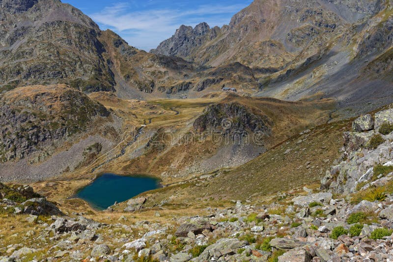 Lake Claret and La Pra Mountain Huts from the Path of Lake David Stock ...