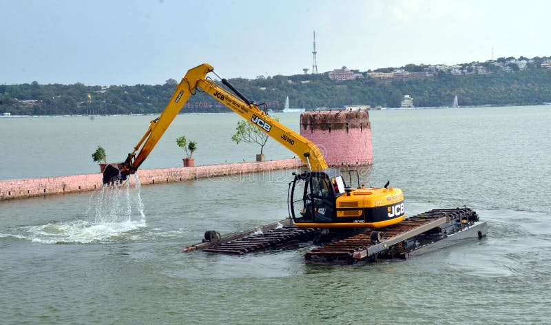 Lake cleaning editorial photography. Image of vehicle - 72972142