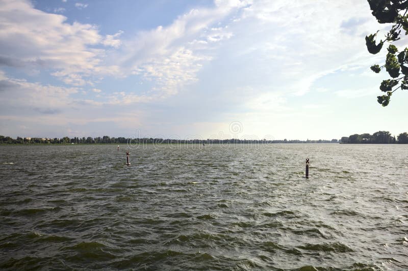 Lake on a Cloudy and Windy Day Stock Photo - Image of cloudy ...