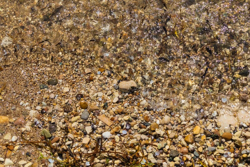 Lake Colorful Pebbles with the Water Closeup, Pebbles Background Stock ...