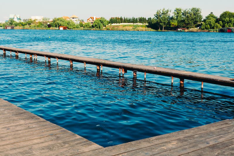 Lake and deck stock photo. Image of season, path, walkway - 63854068