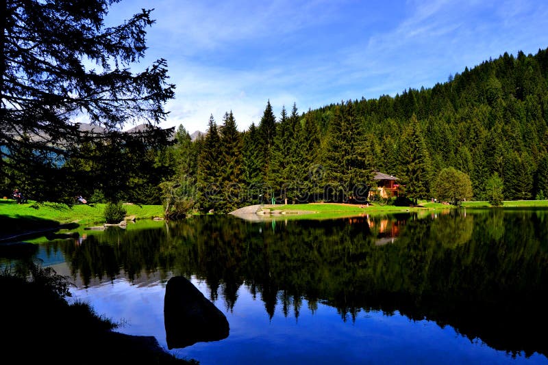 Lake of the deer stock image. Image of clouds, mountains - 24392611