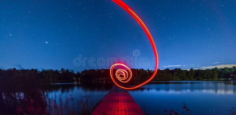 Lake dock at night stock image. Image of earth, evening - 100426139
