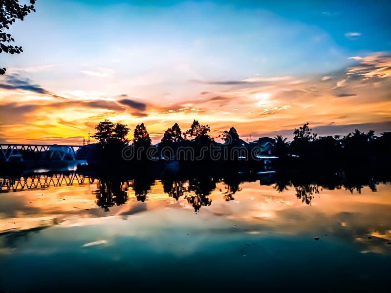 Lake in Dusk and Silhouette Mountain Stock Photo - Image of cloudy ...