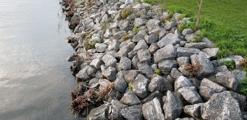 Lake Edge stock photo. Image of lake, rocks, landscape - 128401470
