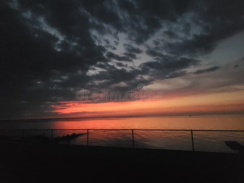 Lake Erie Sunset stock photo. Image of morning, afterglow - 220557558