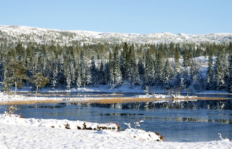 Lake freezing over stock image. Image of mountain, landscape - 34572533