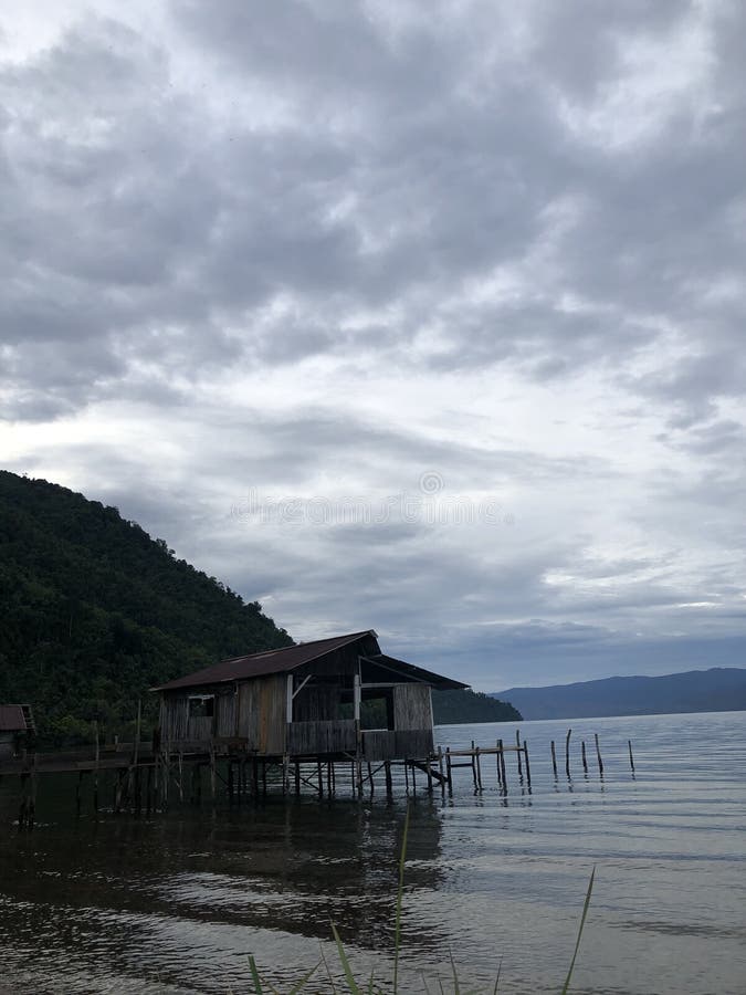 Lake house of matano stock photo. Image of wave, rock - 262563662