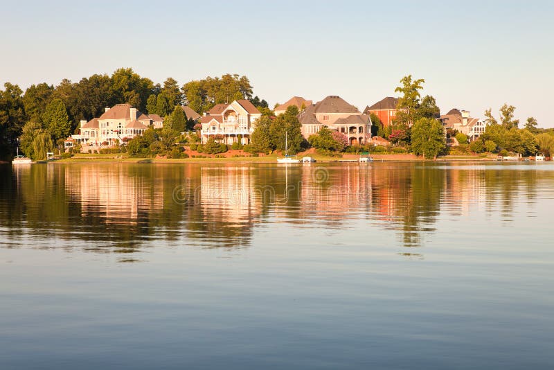 Lake and house on sunset stock photo. Image of scenic - 15485696
