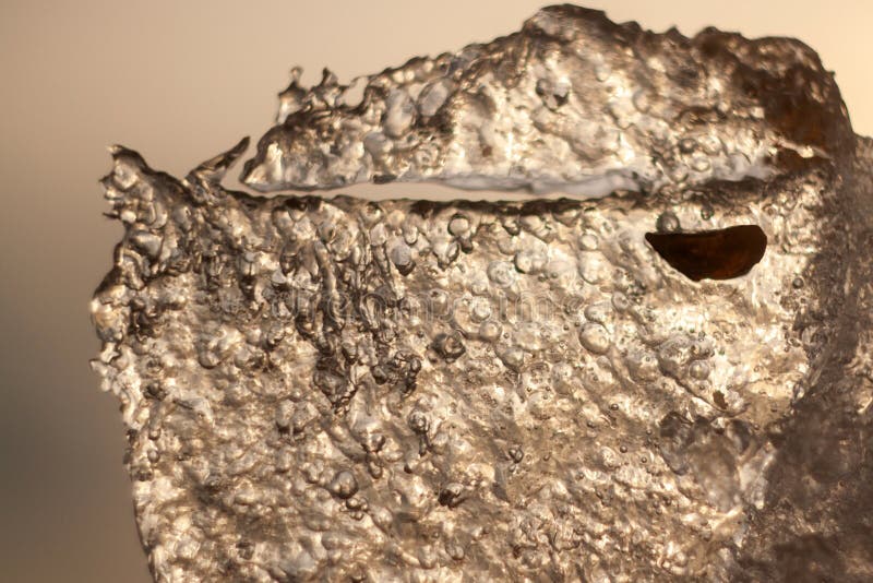 A Lake with Ice and Ice in it and the Sun Reflecting on the Water Stock ...