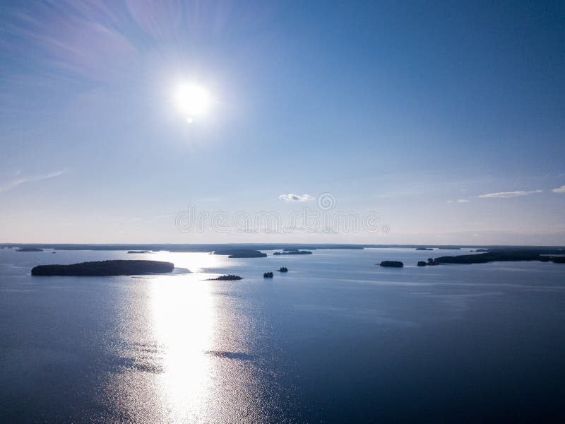Lake Landscape with Bright Sun Stock Image - Image of blue, island ...
