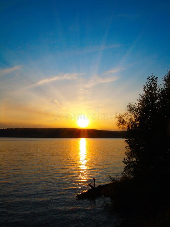Lake landscape with sunset stock image. Image of brightly - 12768253