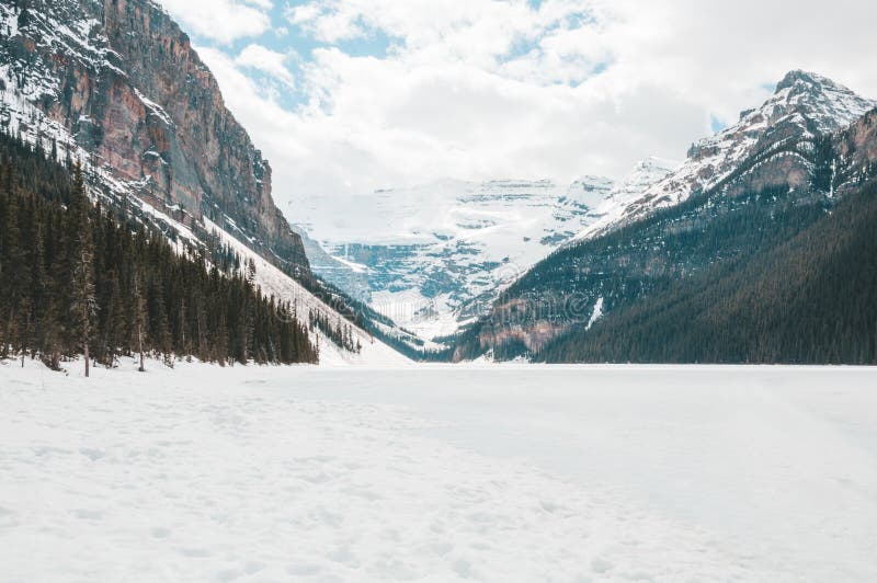 Lake Louise Frozen in Spring Time Stock Photo - Image of landscape ...