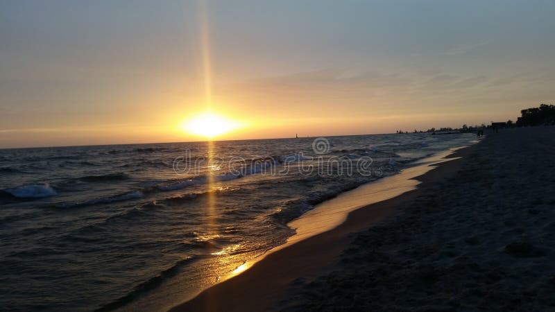 Lake Michigan Sunset stock image. Image of beach, sunset - 128656957
