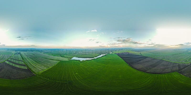 The Lake in the Middle of Endless Green Fields Stock Photo - Image of ...