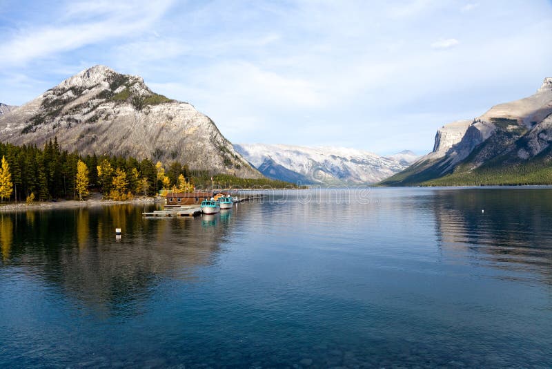 Lake Minnewanka stock image. Image of park, season, forest - 24251389
