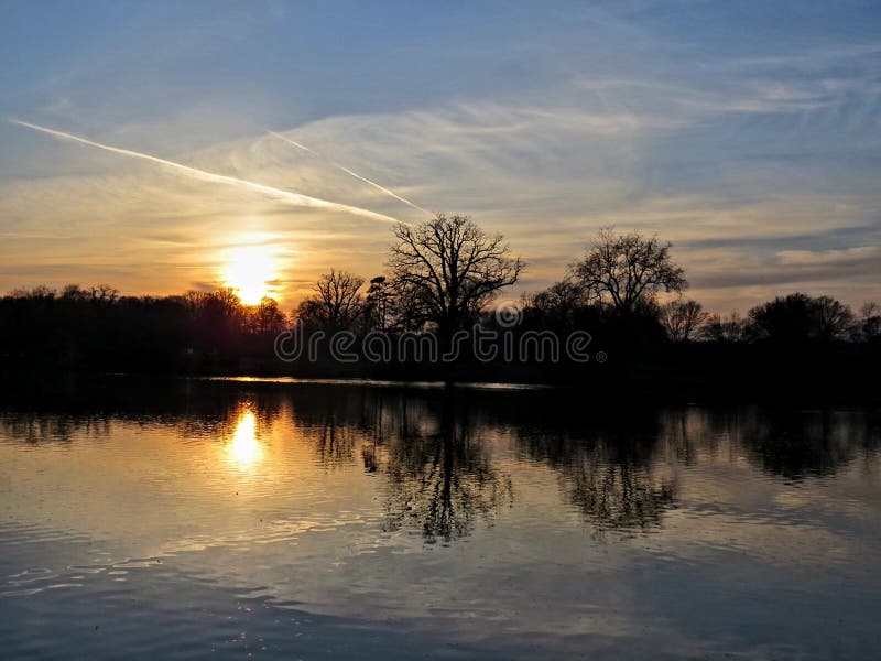 Lake Mirrors the Sky at Sunset Stock Photo - Image of reflection, water ...