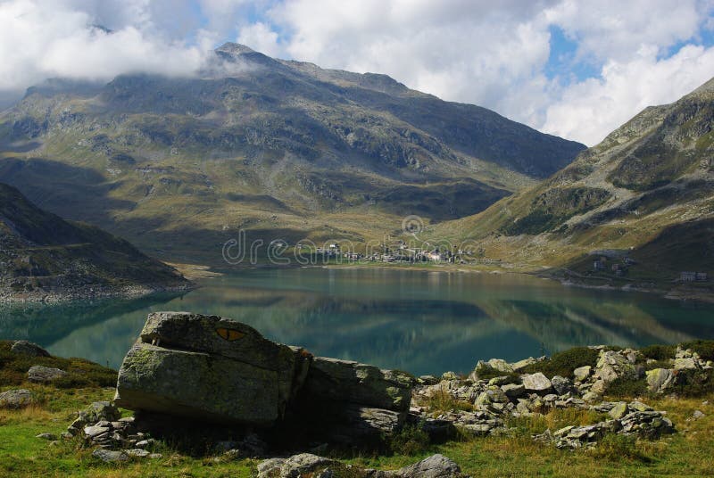 Lake Montespluga with Village of Montespluga Stock Photo - Image of ...