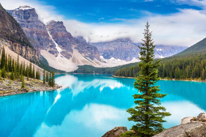 Lake Moraine, Banff National Park Stock Photo - Image of cloud, calm ...