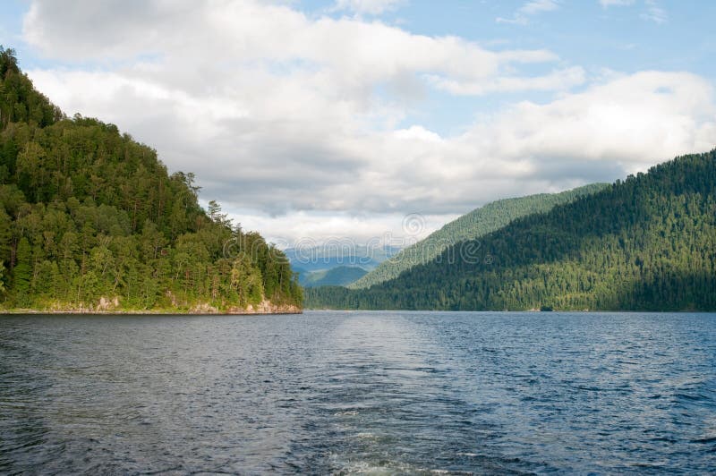 Lake between mountains stock image. Image of teletskoe - 10852741