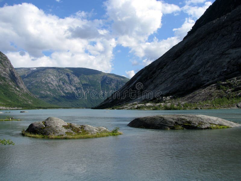 A Lake between the Mountains Stock Photo - Image of glacier, trouble ...