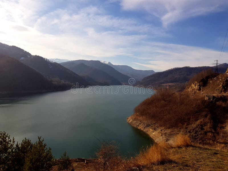 Lake between the mountains stock image. Image of hill - 189891011