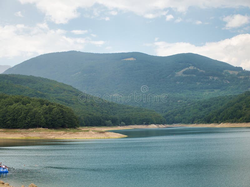 A Lake in the Mountains. Mountain Landscape, Calm Lake Stock Photo ...