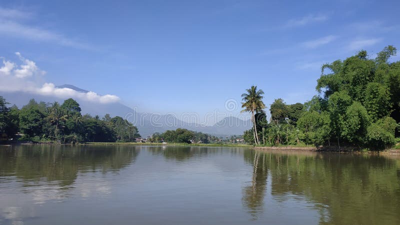 A Lake with a Nice an Shiny View Sky and Water Reflection Stock Photo ...