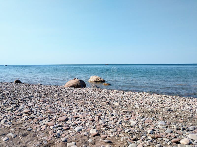 Lake Ontario Rock beach stock photo. Image of rock, water - 197733508