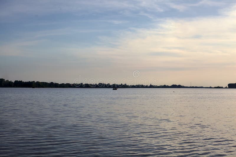 Lake with the Opposite Shore in the Distance Lake at Sunset Stock Image ...