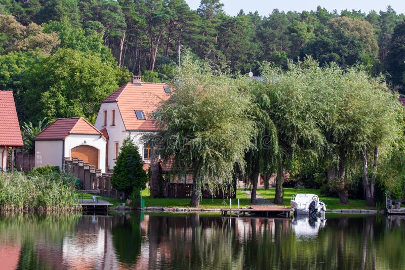 A Lake Overlooking a House in Lubniewice, Poland Stock Image - Image of ...
