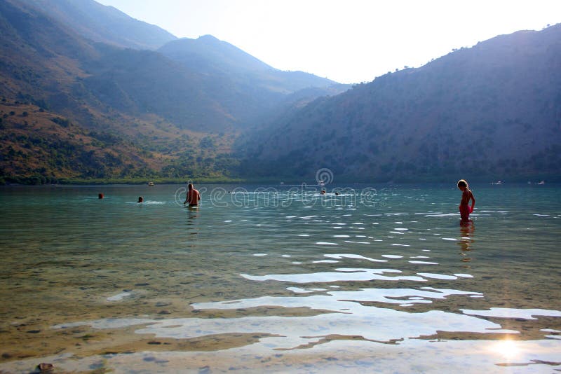Lake people stock photo. Image of swimming, kournas, wave - 1085140