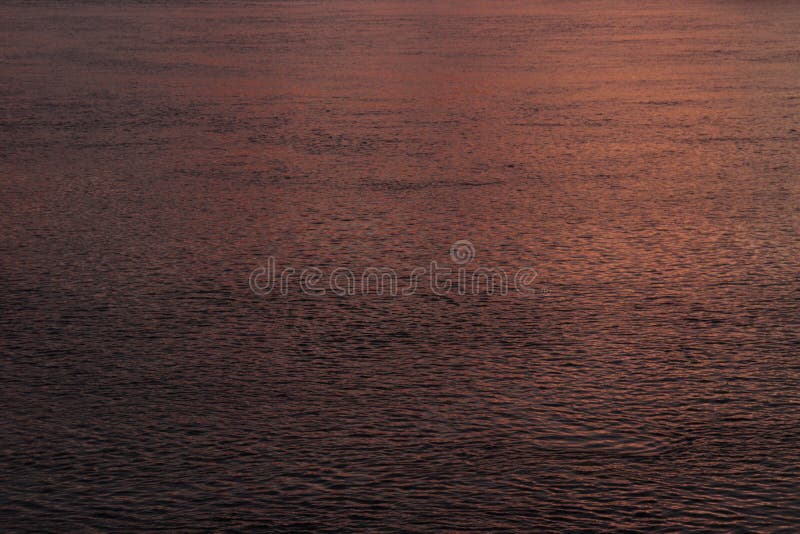A lake reflecting sunset stock photo. Image of frame - 255377054