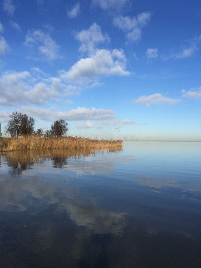 Lake with reflection stock image. Image of clouds, lake - 54371771