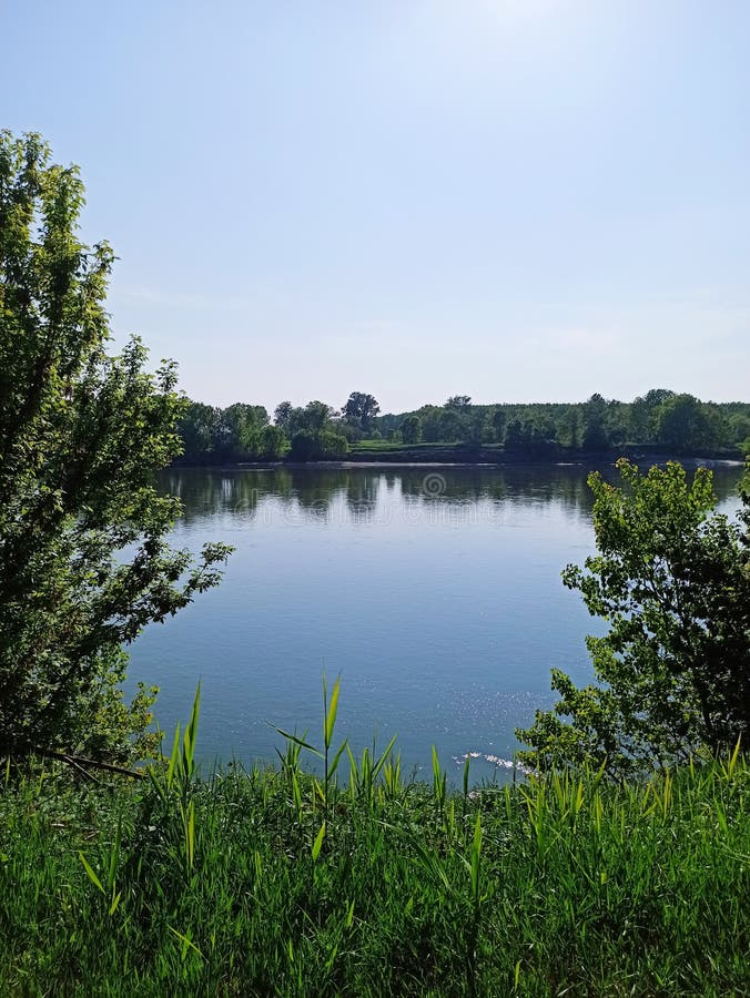 Lake River View with Sun in the Blue Sky Light Nature Stock Image ...