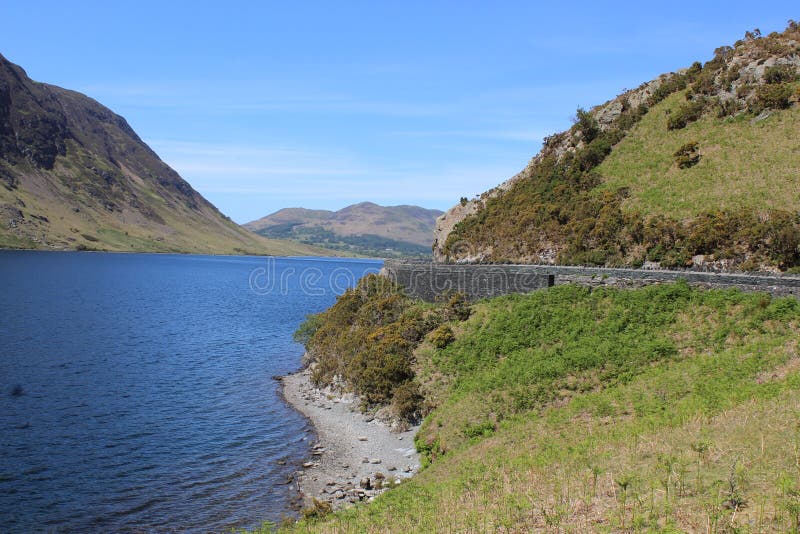 Lake road on summer day stock photo. Image of ridge - 215179768