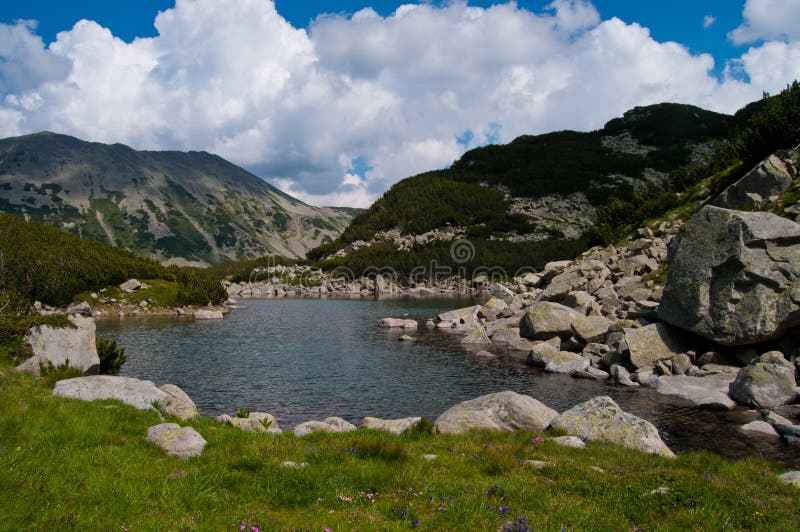 Lake and Rocks stock photo. Image of green, water, peak - 15698430