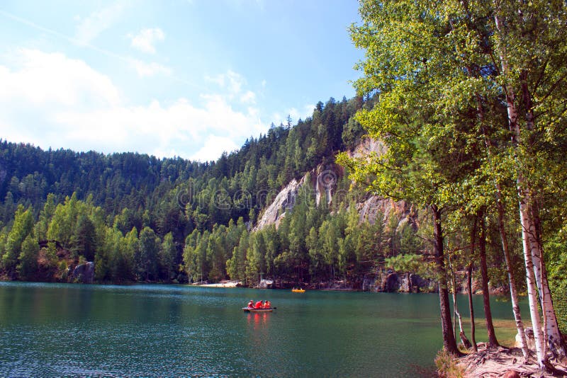 Lake and rocks stock image. Image of light, destinations - 87757941