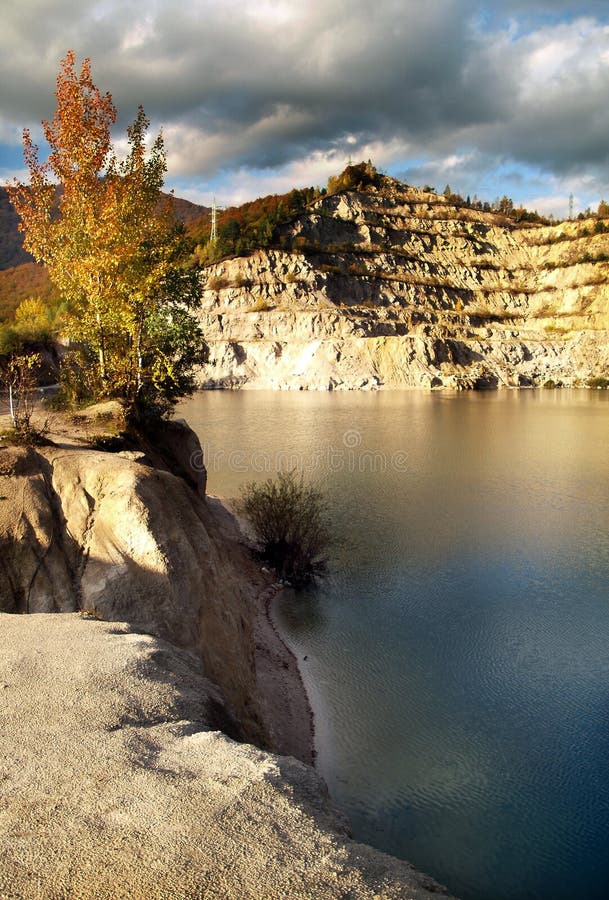 Lake in rocky valley stock image. Image of calm, terrain - 3350325