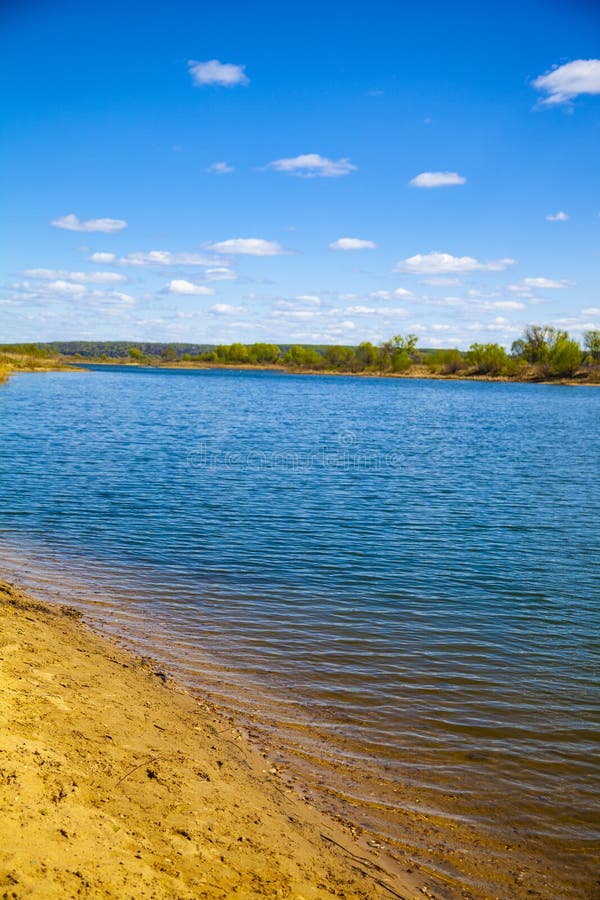 Lake and sandy beach stock photo. Image of scenery, nature - 149048660