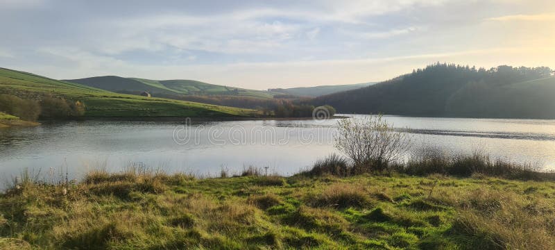Lake scene buxton stock image. Image of shore, hill - 216663789