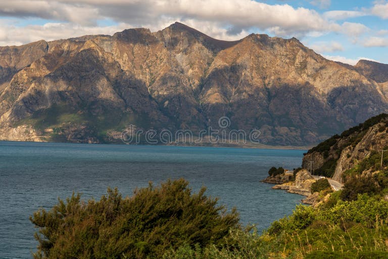 The Mountains Along Both Sides of Lake Hawea Near Wanaka Stock Photo ...