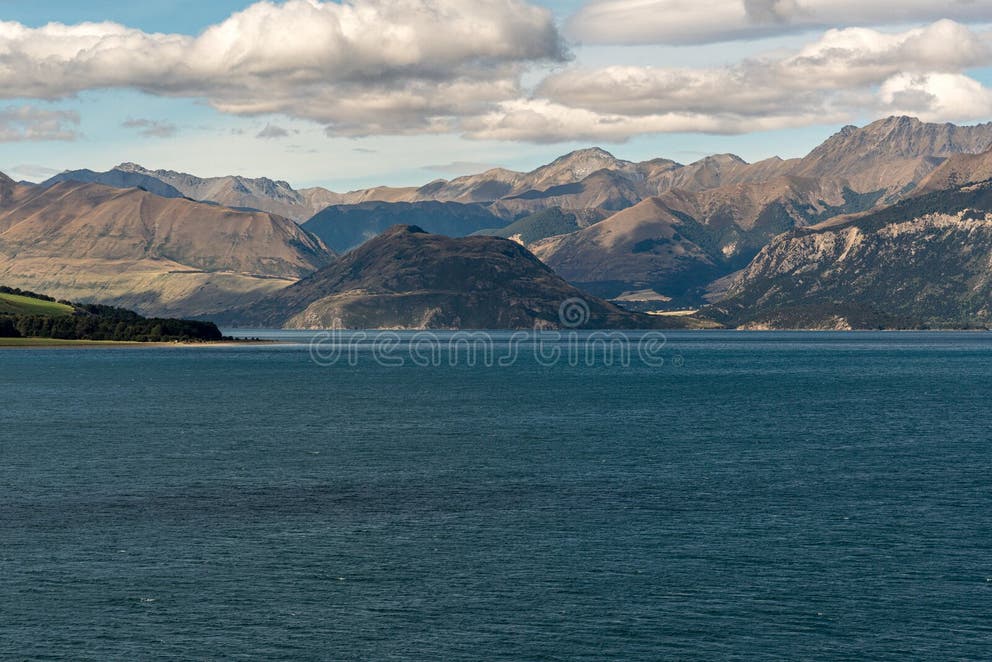 The Mountains Along Both Sides of Lake Hawea Near Wanaka Stock Image ...