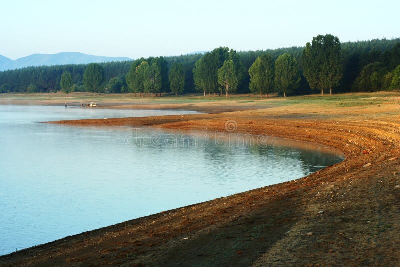 Lake shore stock photo. Image of outdoors, golden, fisherman - 9552768