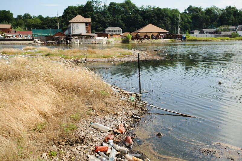 The Lake and the Shore are Littered with Garbage Stock Photo - Image of ...