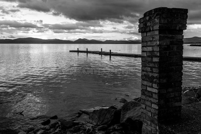 A Lake Shore, with an Old Brick Column in the Foreground and a P Stock ...