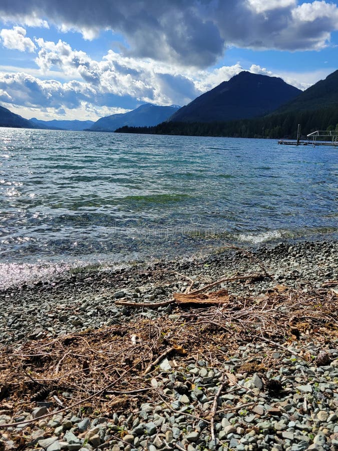 Lake shore rocks stock photo. Image of reservoir, coast - 224773940