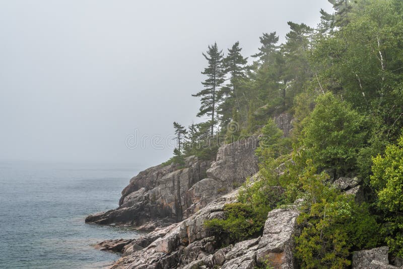 Lake shore stock image. Image of water, rocky, shore - 184210245