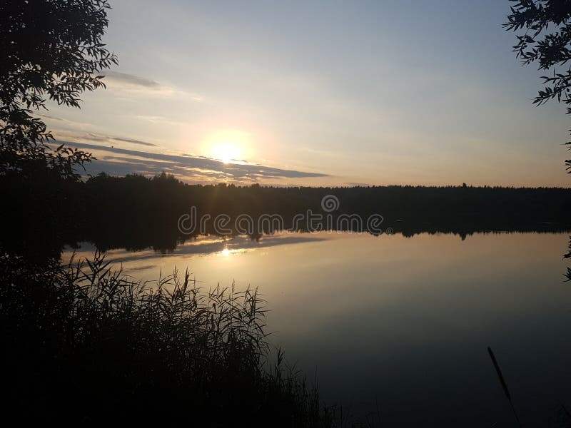 Lake shore view stock photo. Image of sunset, lake, view - 114047656